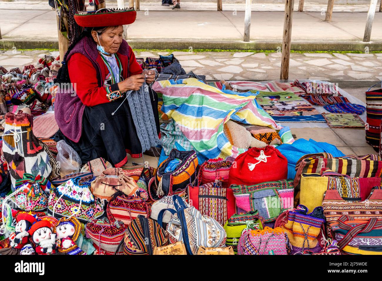 A Peruvian Indigenous Quechua Woman Selling Woollen Handicrafts At The ...