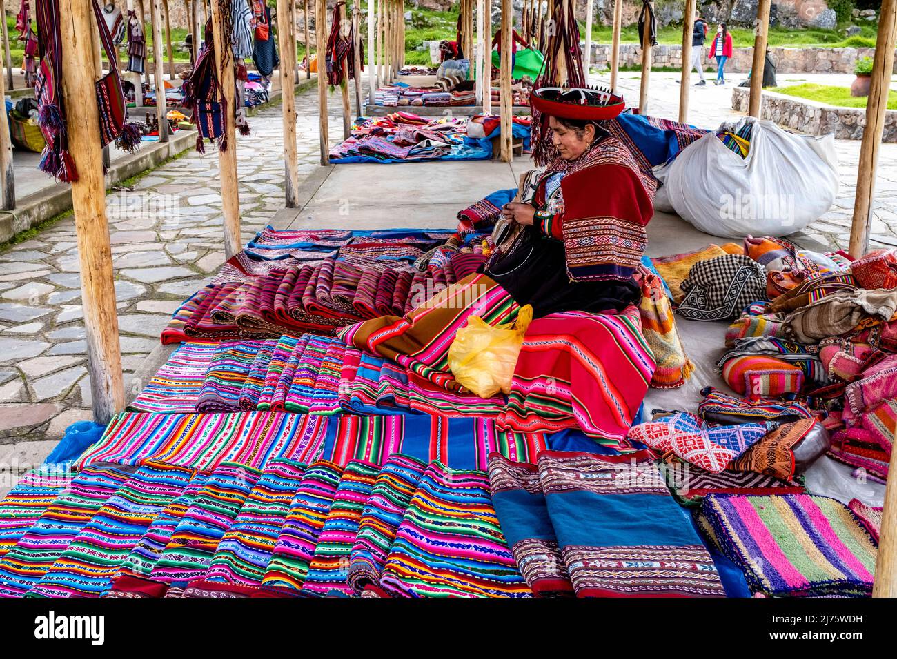 A Peruvian Indigenous Quechua Woman Selling Woollen Handicrafts At The ...