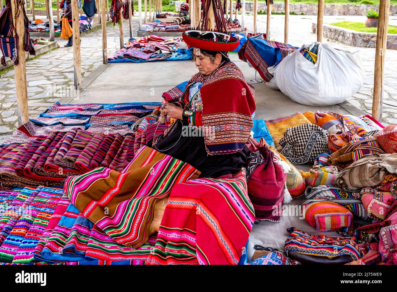 A Peruvian Indigenous Quechua Woman Selling Woollen Handicrafts At The ...