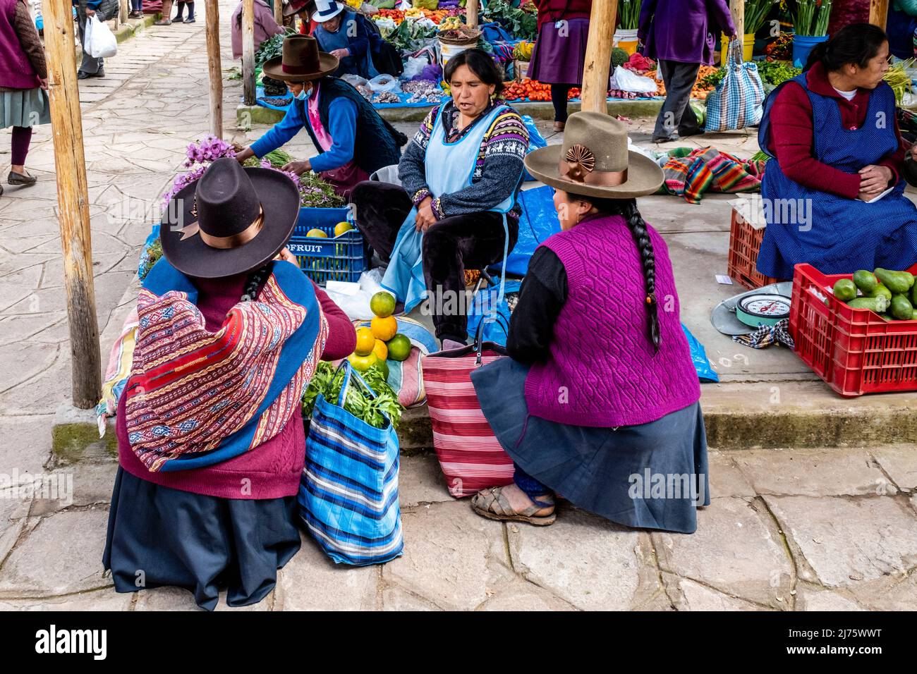 Indigenous Quechua Women At The Famous Sunday Market In The Village Of ...
