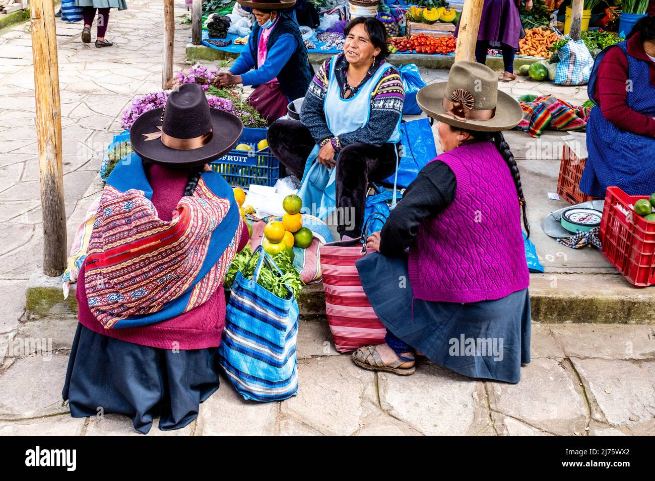 Indigenous Quechua Women At The Famous Sunday Market In The Village Of ...