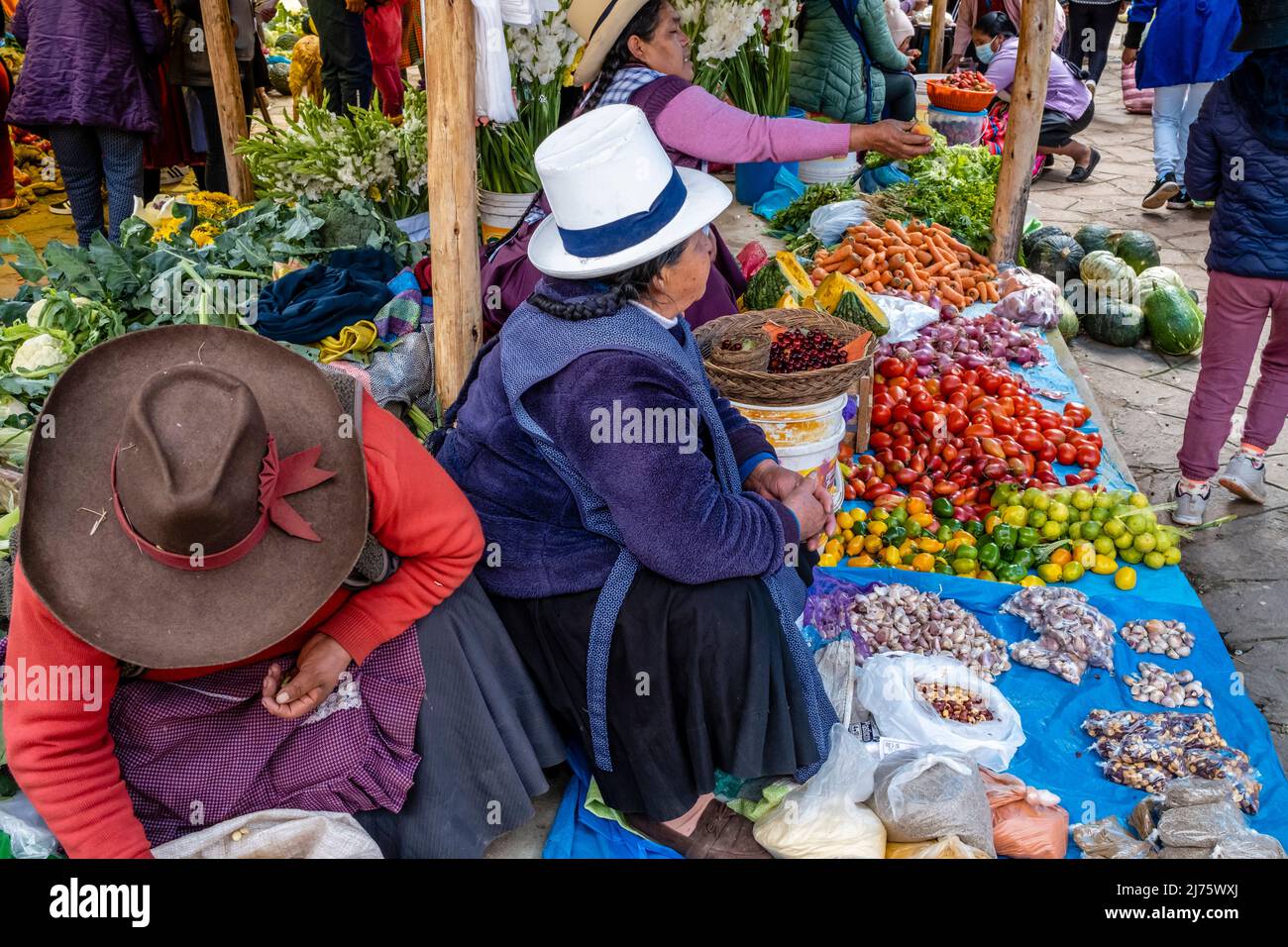 Indigenous Quechua Women Selling Vegetables At The Sunday Market In The ...