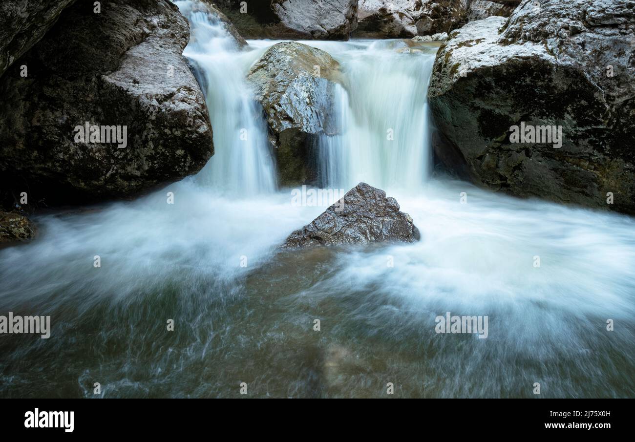 Small waterfall between rocks. Long exposure. Allgäu Alps, Germany ...