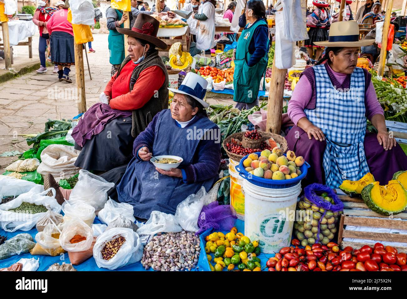 Indigenous Quechua Women Selling Vegetables At The Sunday Market In The ...