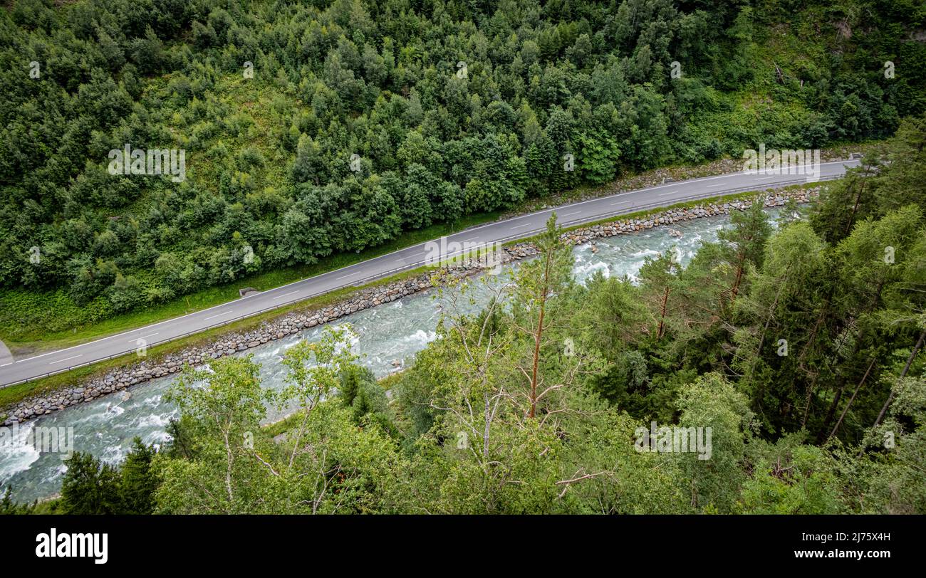 Street through a valley in the Austrian Alps Stock Photo - Alamy