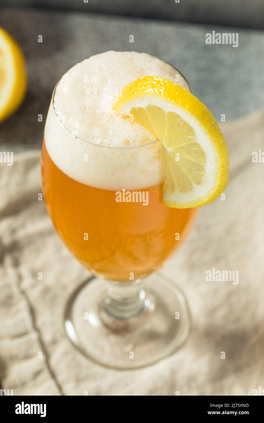 Boozy Refreshing Beer Shandy Cocktail with a Lemon Garnish Stock Photo ...