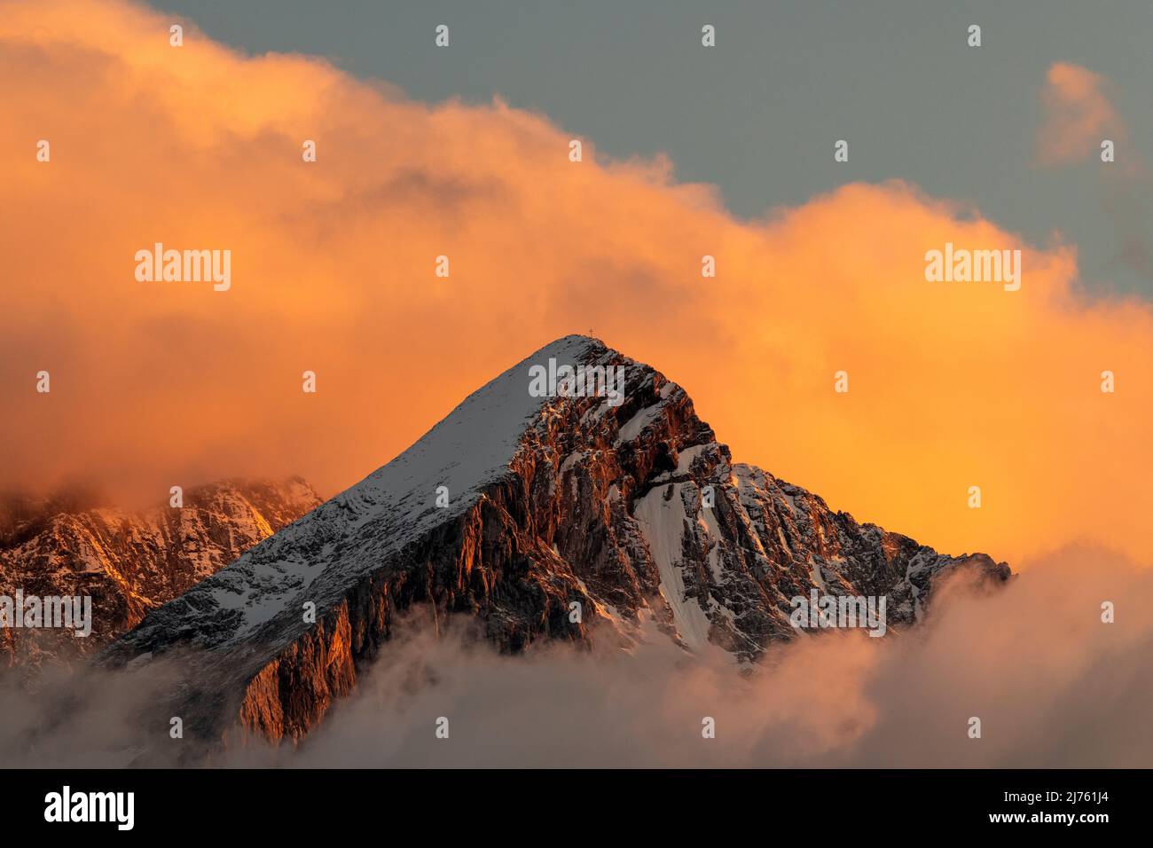 During alpenglow and with beautiful cloud atmosphere hi-res stock ...