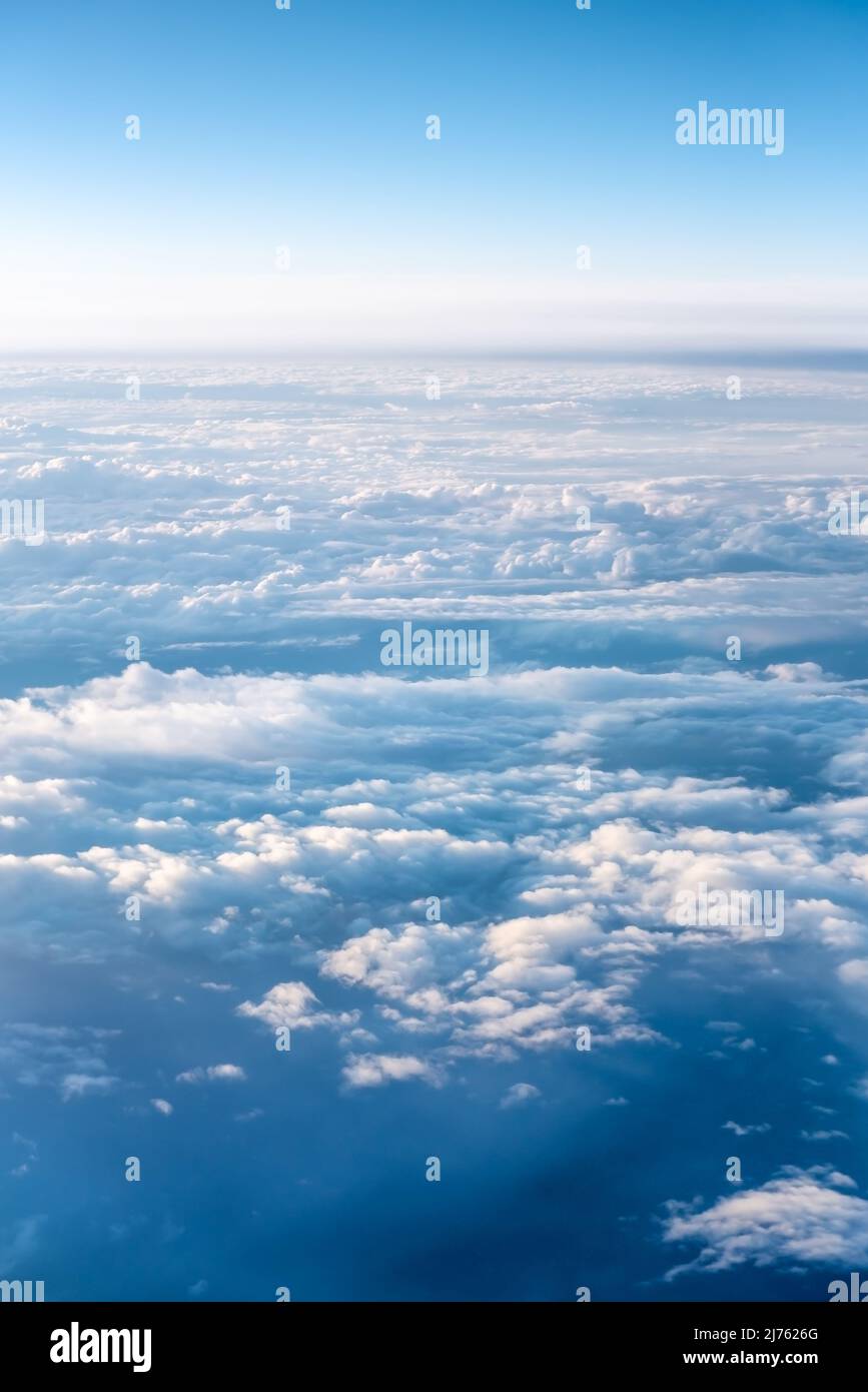 White cumulus clouds on clear blue sky background closeup, overcast ...