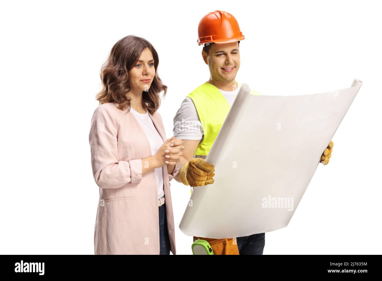 Engineer with a helmet showing a plan to a young woman isolated on ...