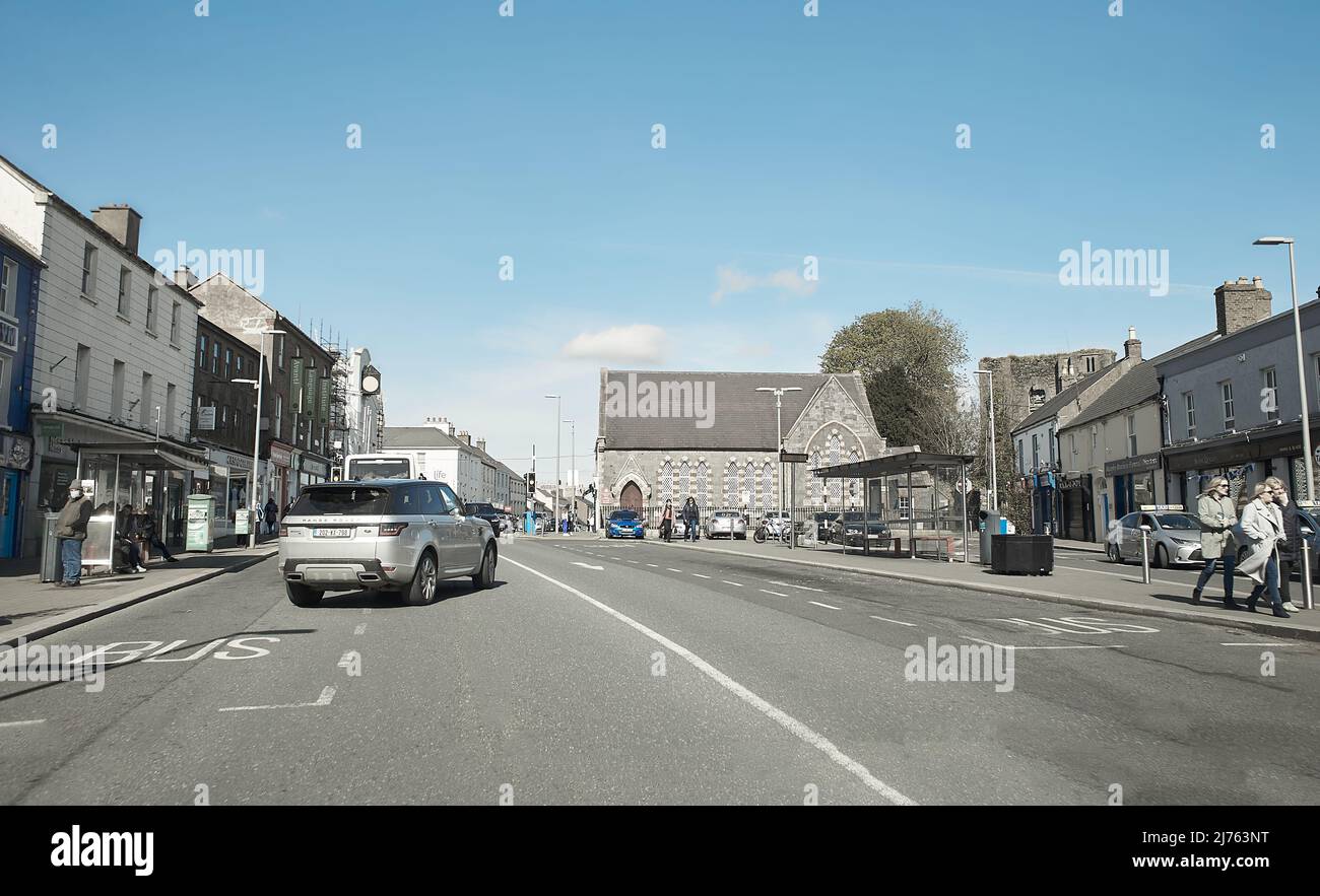Rear view of cars driving on motorway, Ireland. Road with metal safety ...
