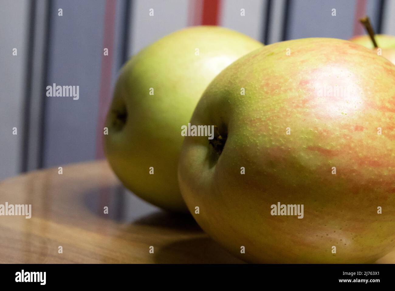 Two ripe apples, side view. A close-up shot of fruit Stock Photo - Alamy