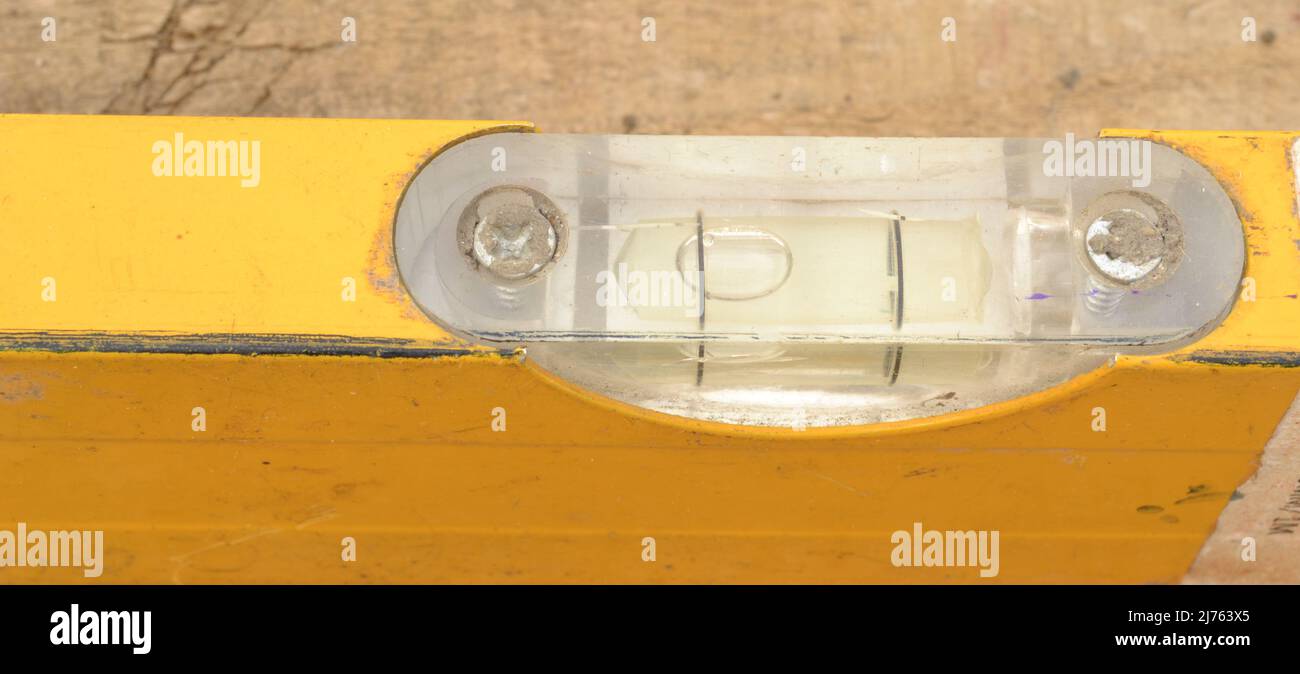 A level tool used to determine whether a surface is horizontal (level ...