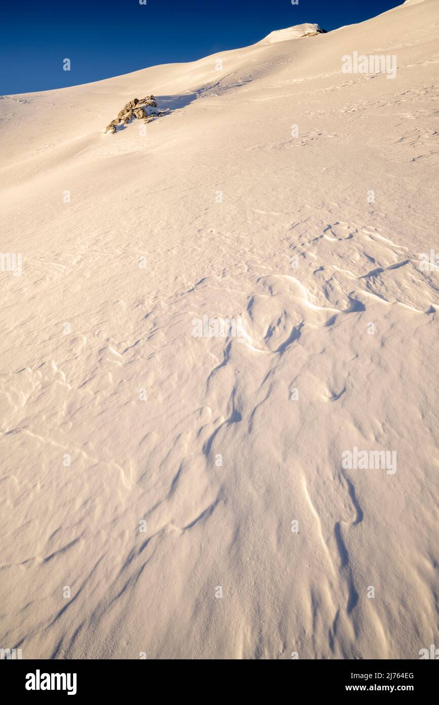 Snow forms on the Karwendel, in the background blue sky and view to the ...