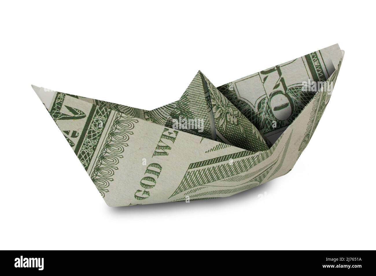 Boat or ship made from a us one dollar bill isolated on white ...
