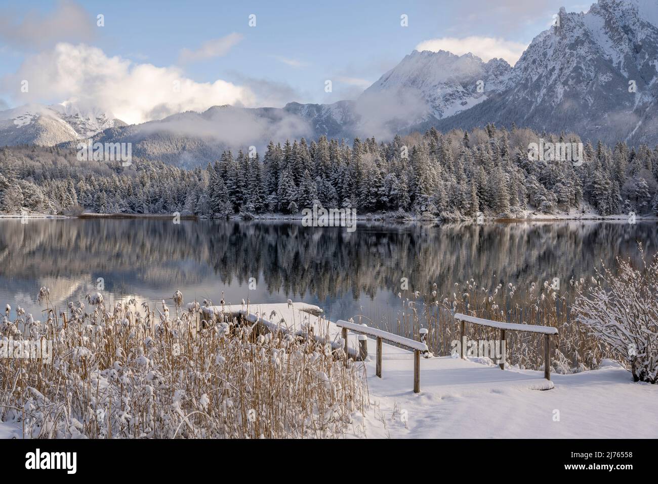 The Lautersee above Mittenwald in the fresh snow of a beautiful winter ...