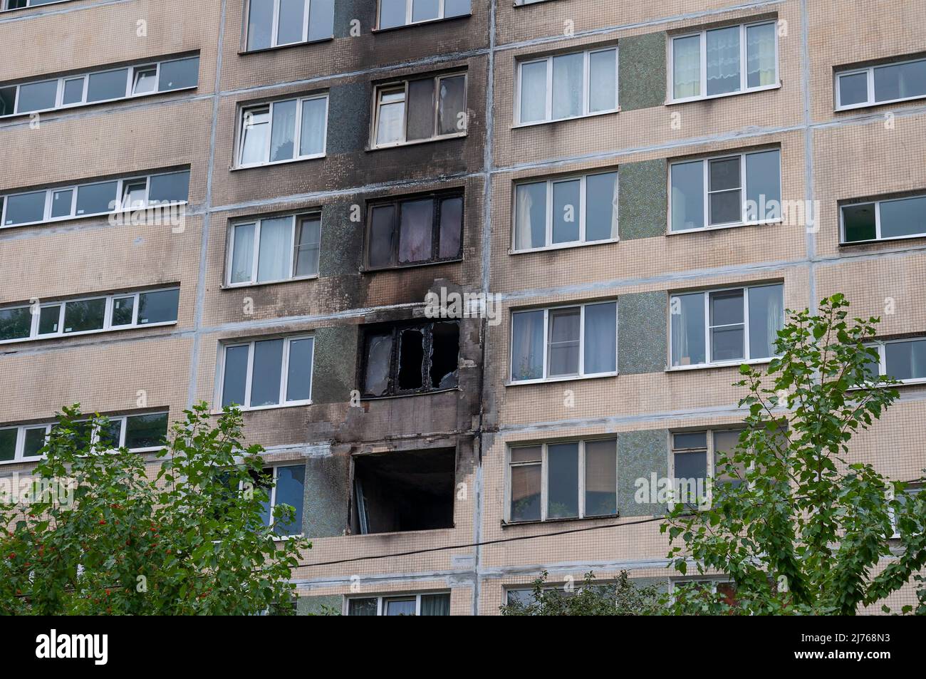 Windows of an apartment building after a fire Stock Photo - Alamy