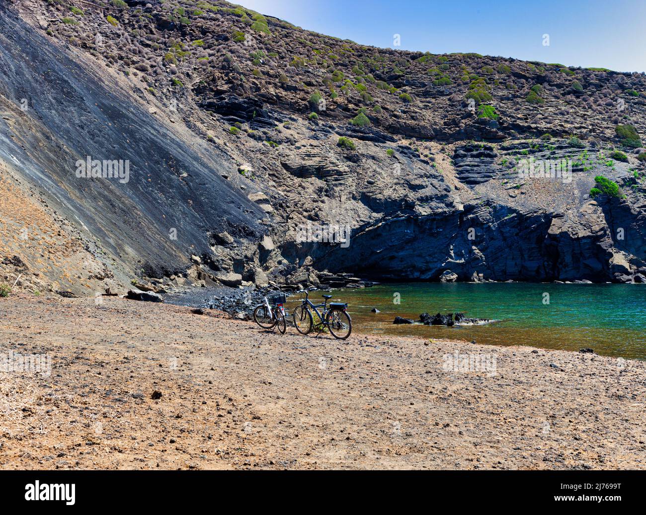 View of the scenic lava rock cliff on the Linosa island. Sicily Stock ...