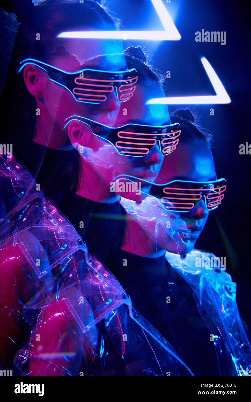 Multi-composition of trendy cyber girl in neon LED goggles and ...