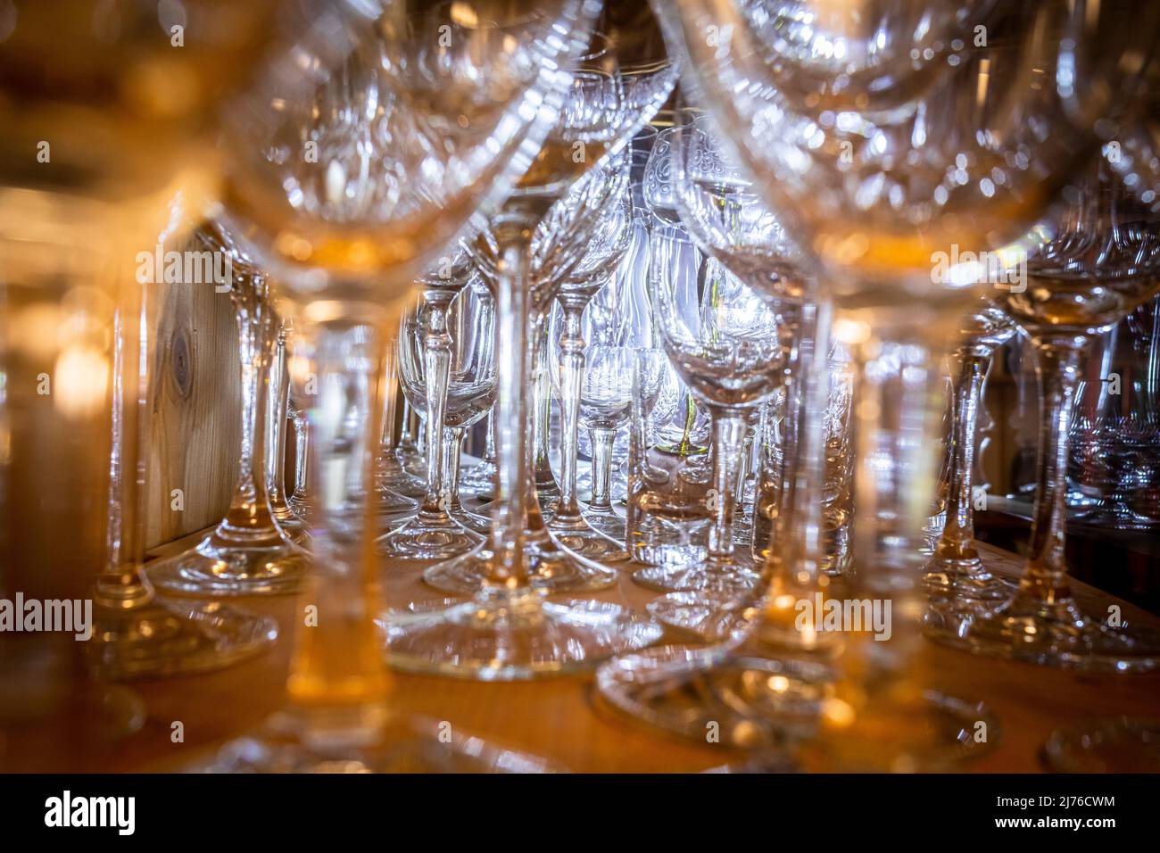 Collection of various beverage glasses in a wooden cabinet Stock Photo ...