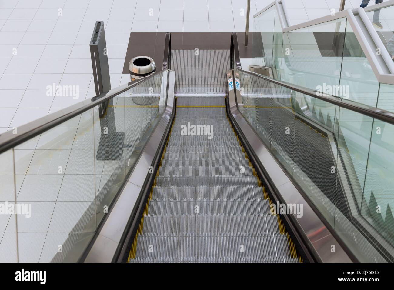 Escalator in International Airport with moving staircase Stock Photo ...