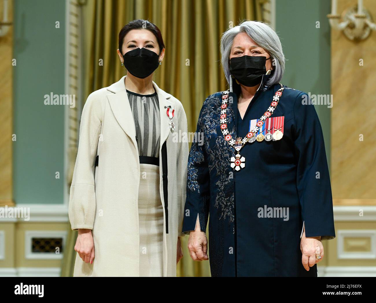Chan Hon Goh of Vancouver and Toronto is invested as a member of the ...