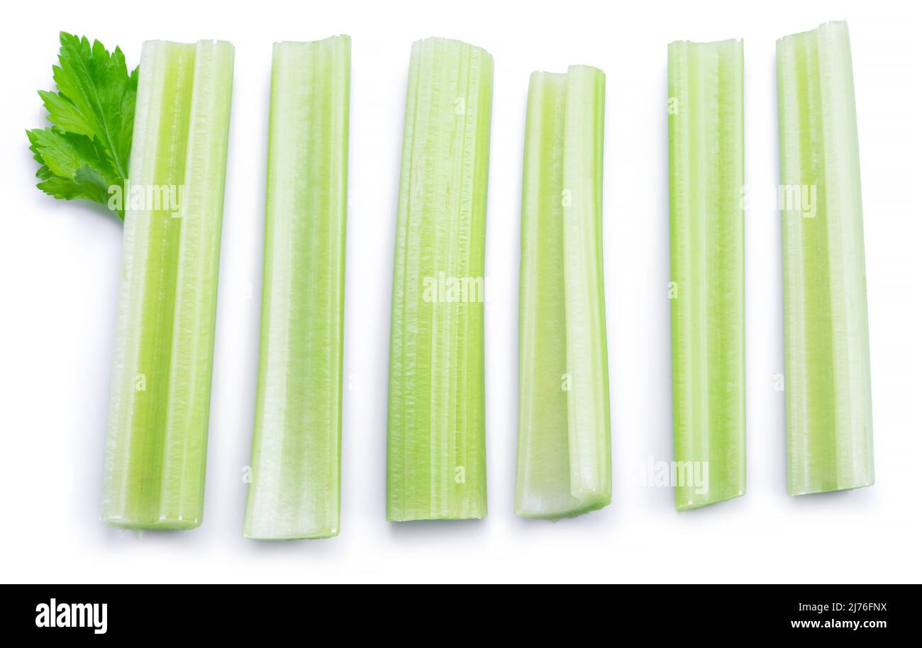 Pile of celery ribs isolated on white background Stock Photo - Alamy