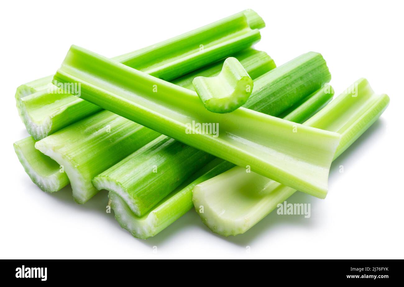 Pile of celery ribs isolated on white background Stock Photo - Alamy
