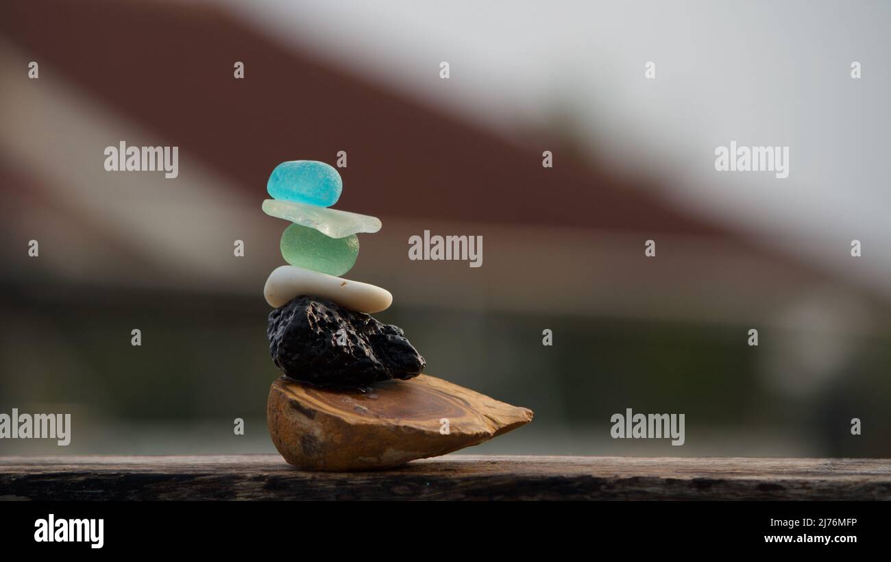 Different types of stone pebbles including sea glass and lava stone ...