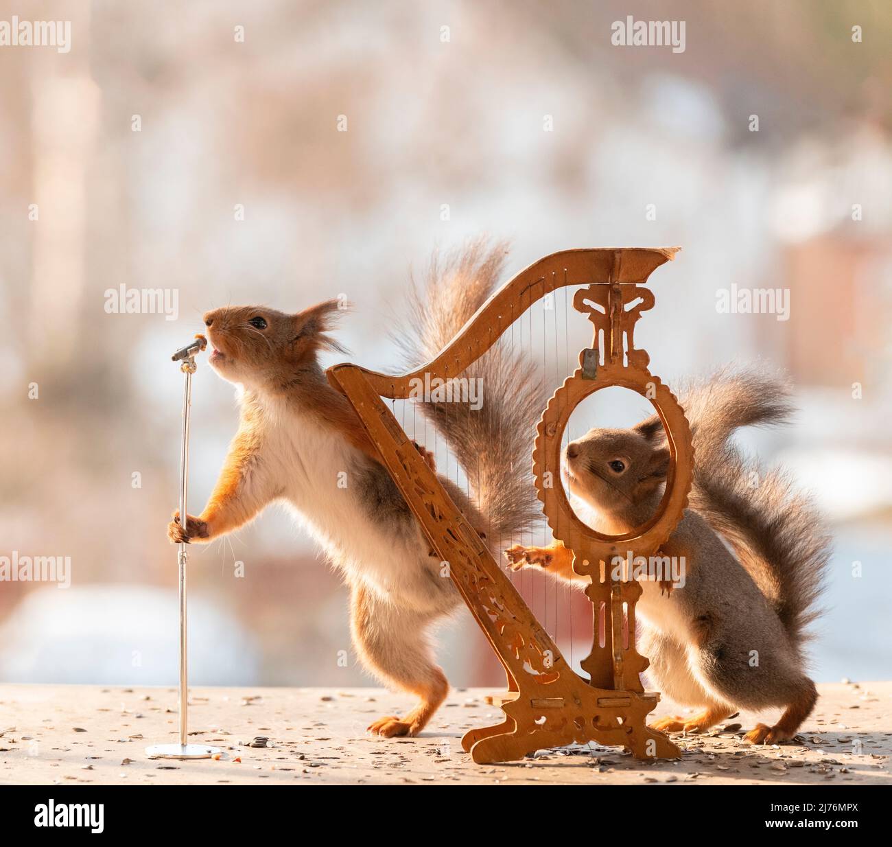 Holding harp hi-res stock photography and images - Alamy