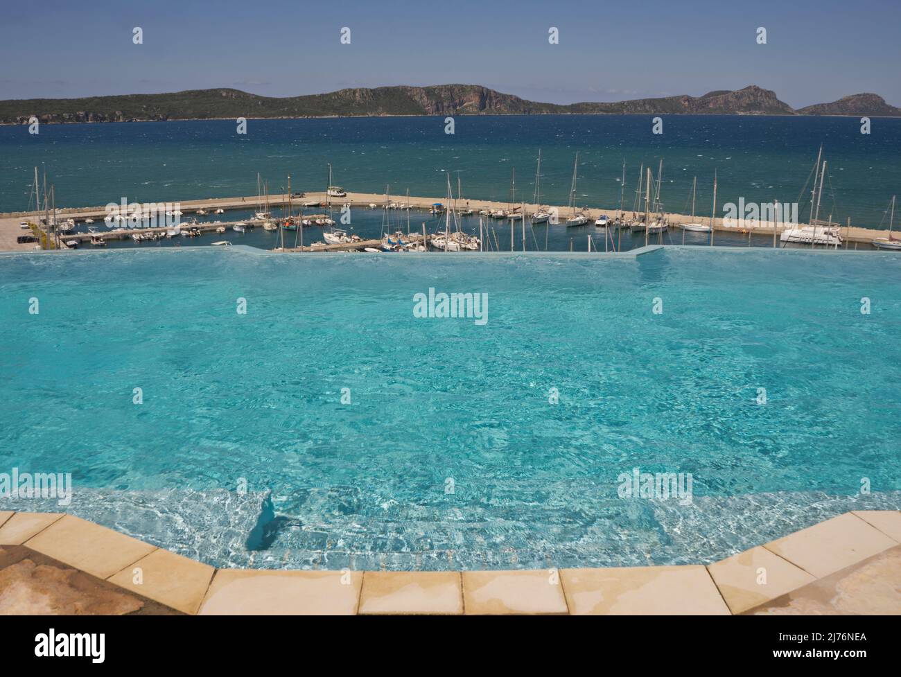 Views of an infinity swimming pool at a hotel by the harbour of Pylos ...
