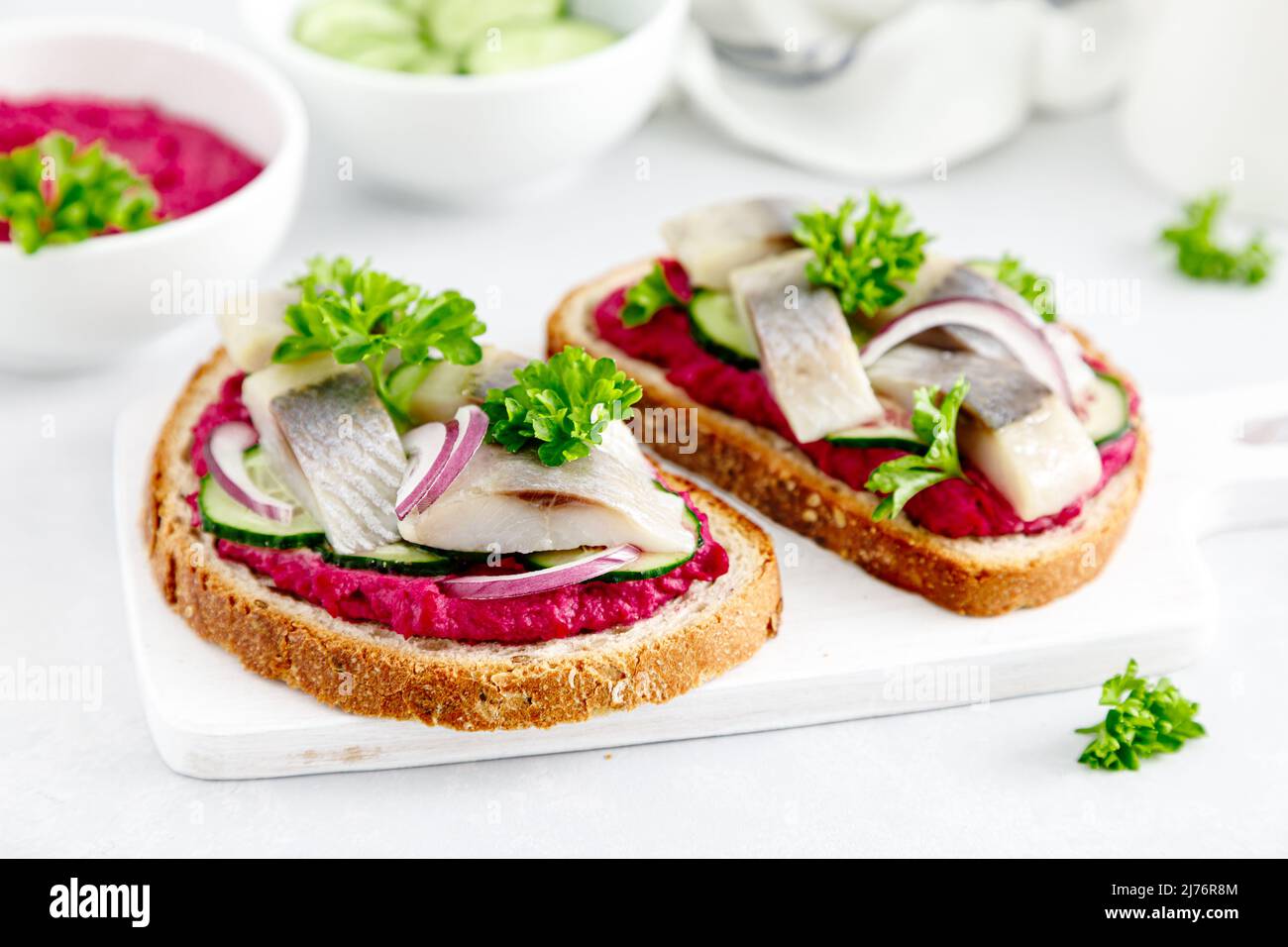 Sandwiches, toasts with salted herring and beetroot pate Stock Photo ...