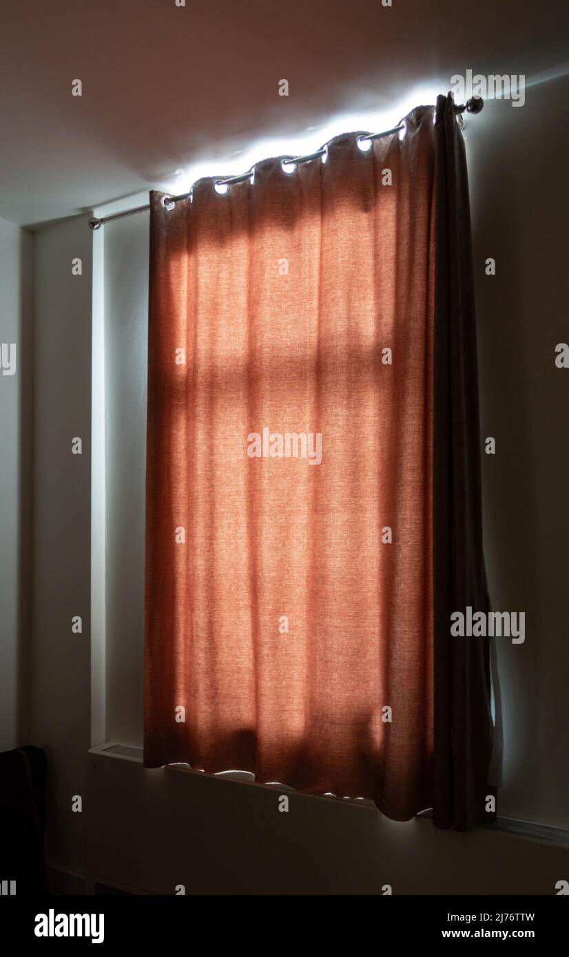 Drop over window keeping daylight out of bedroom Stock Photo - Alamy