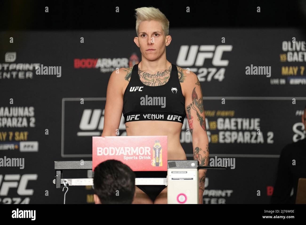 PHOENIX, AZ - May 6: Macy Chiasson steps on the scale at Hyatt Regency ...
