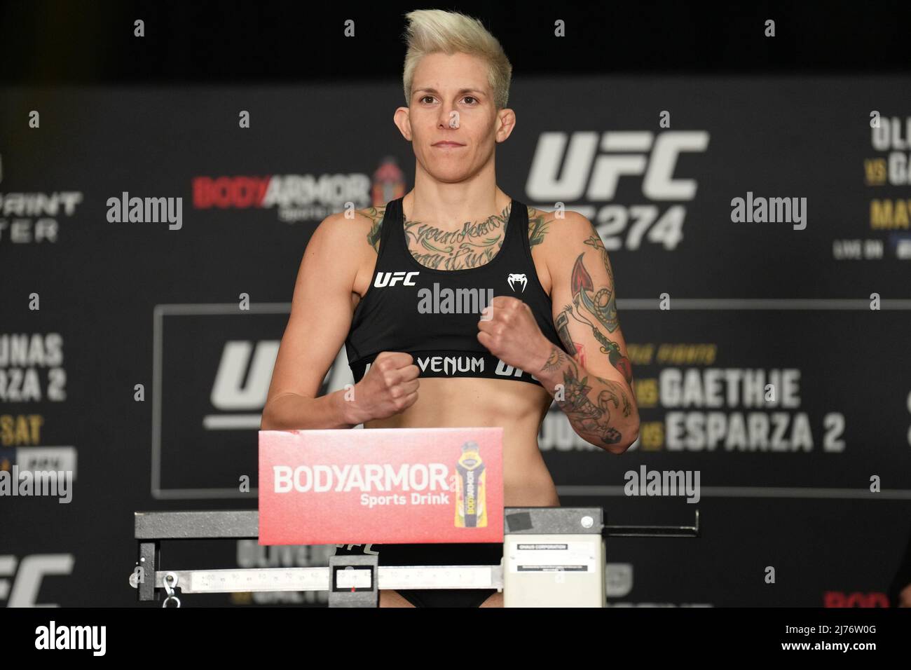 PHOENIX, AZ - May 6: Macy Chiasson steps on the scale at Hyatt Regency ...