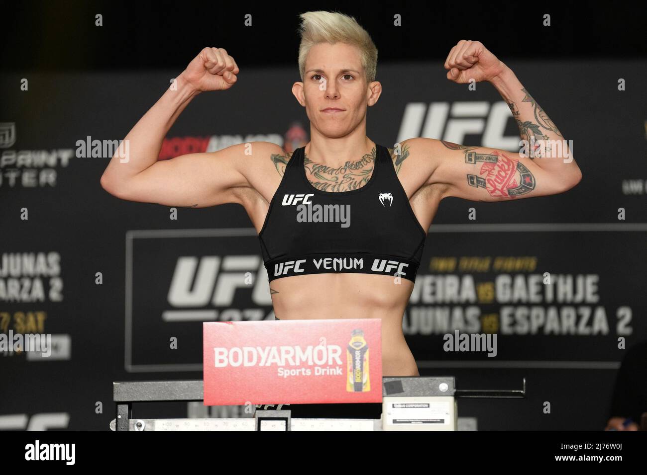 PHOENIX, AZ - May 6: Macy Chiasson steps on the scale at Hyatt Regency ...