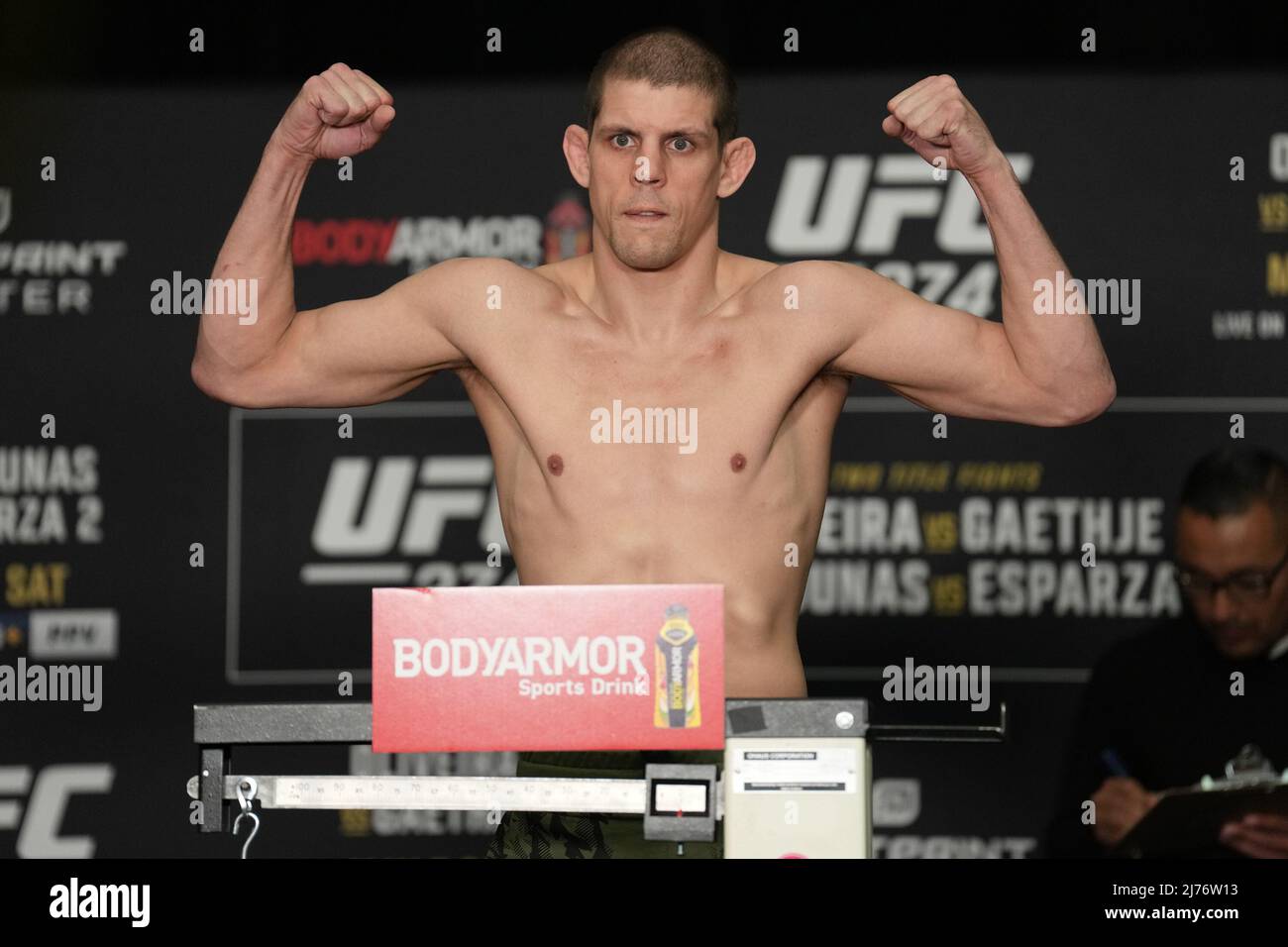 PHOENIX, AZ - May 6: Joe Lauzon steps on the scale at Hyatt Regency for ...