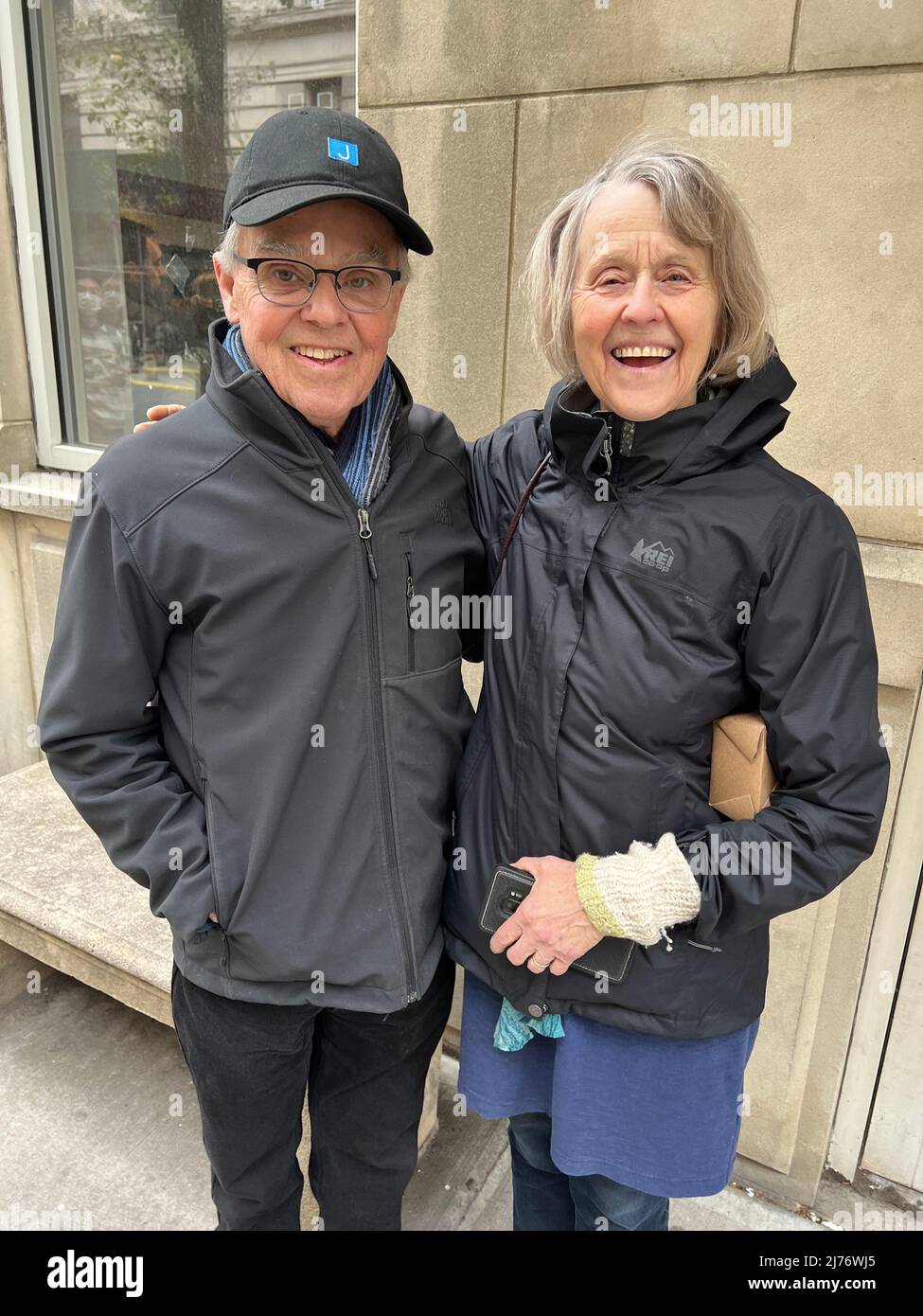 Happy, healthy senior citizen couple on the street on the upper ...