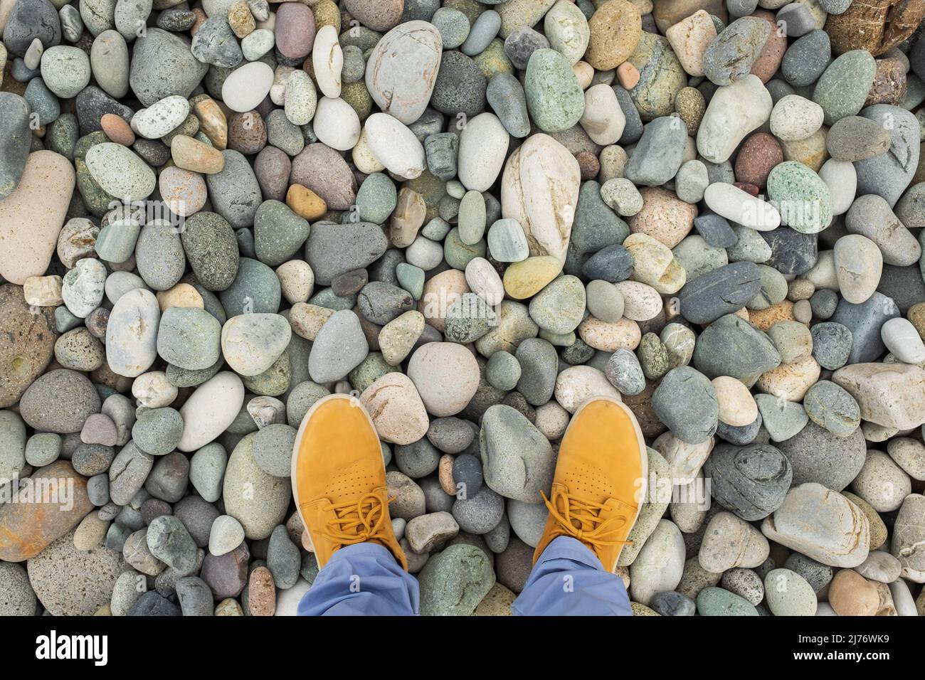 Man standing in white stones Top view for abstract design Stock Photo ...