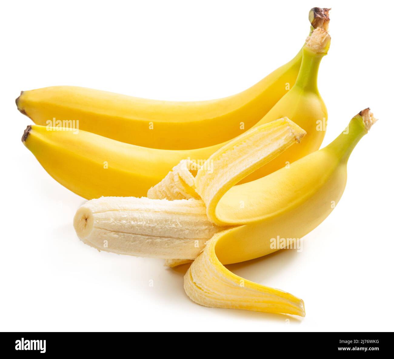 Perfect ripe yellow bananas and one peeled banana isolated on white ...