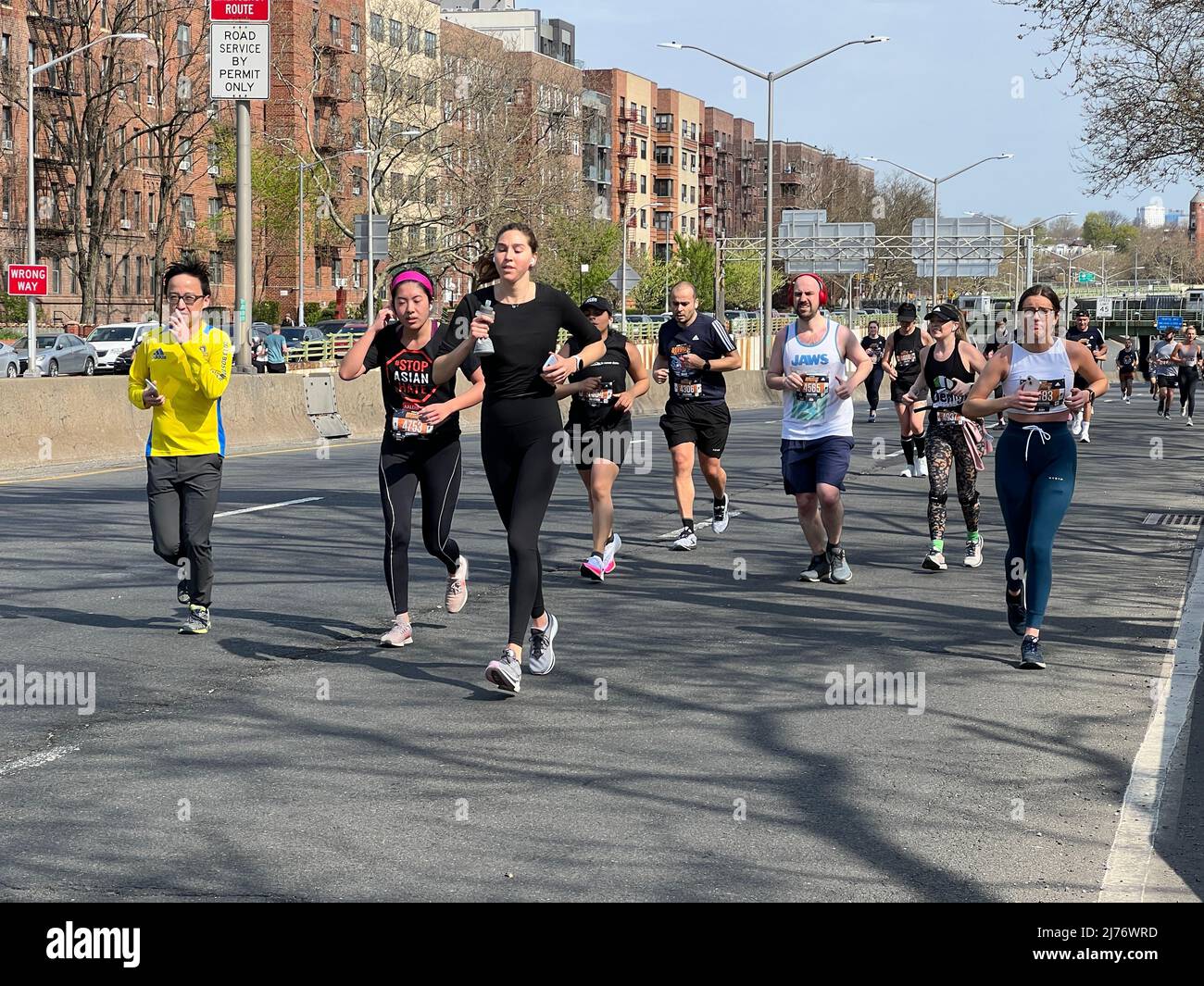 Runners deep into the Brooklyn full and 1/2 Marathon on Ocean Parkway ...