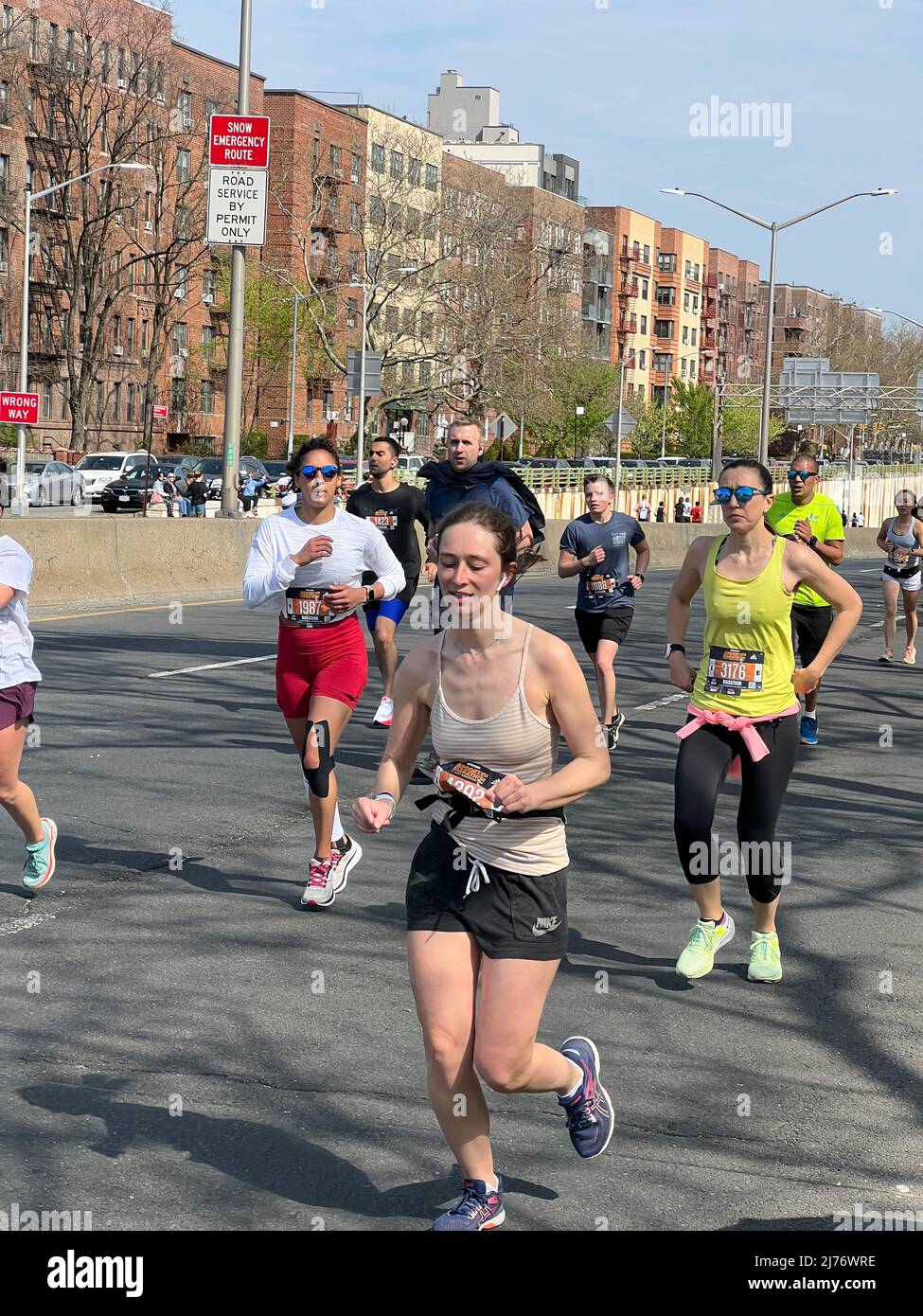 Runners deep into the Brooklyn full and 1/2 Marathon on Ocean Parkway ...