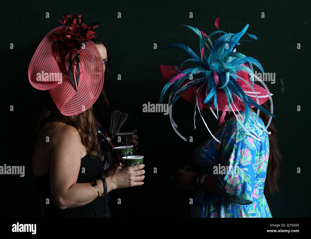 Horse racing fans show off their Oaks fashion attire as they prepare ...