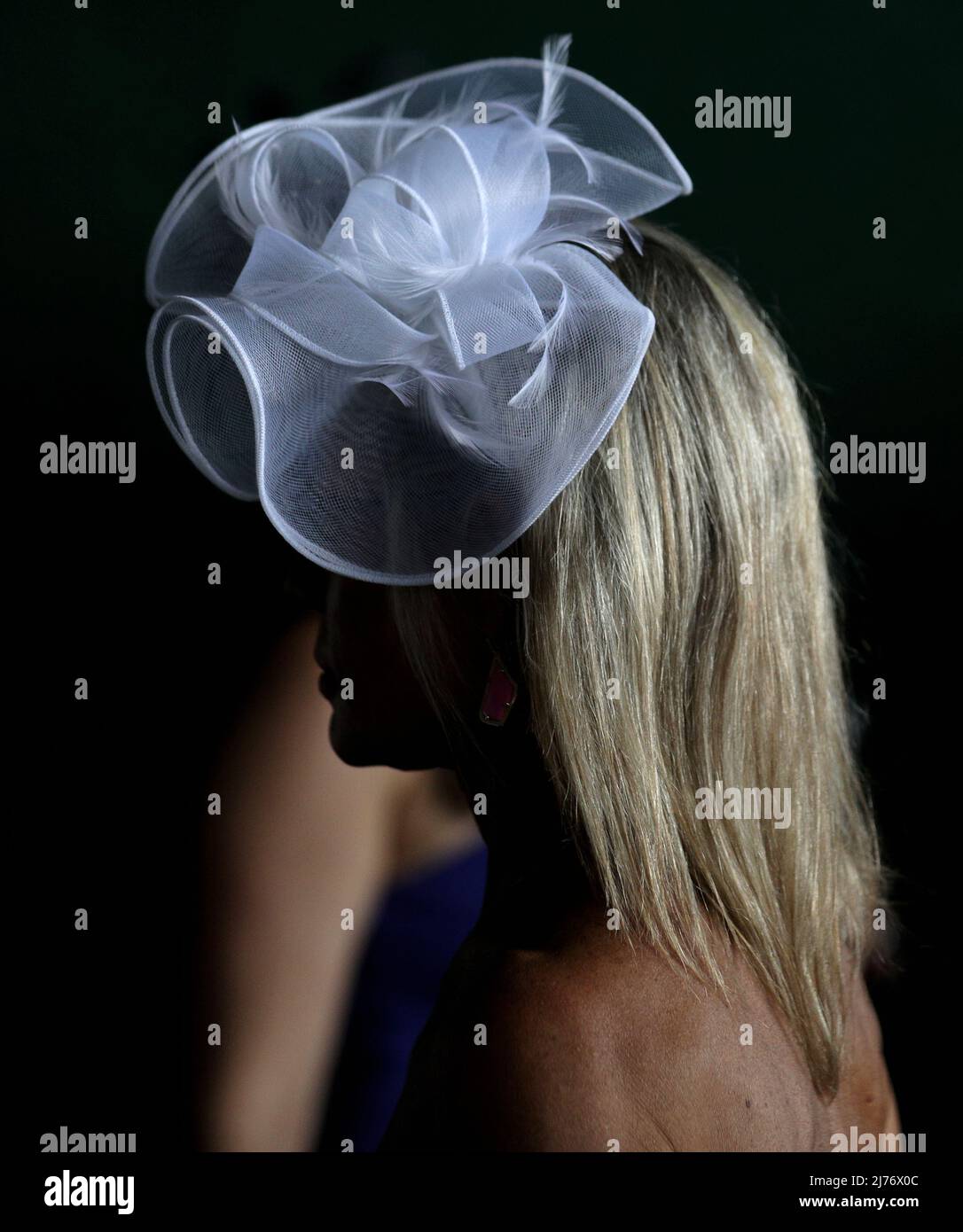 Horse racing fans show off their Oaks fashion attire as they prepare ...