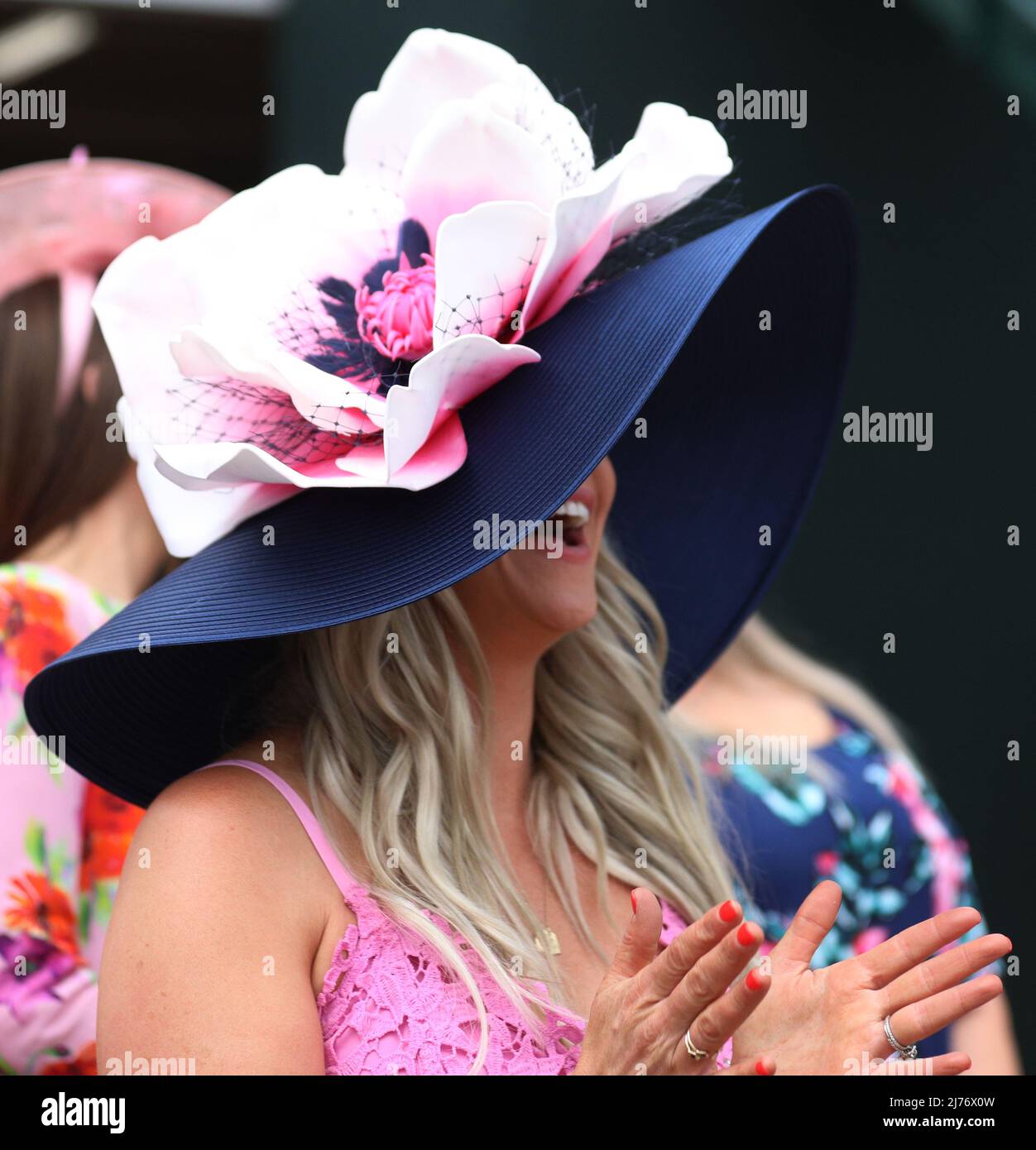 Horse racing fans show off their Oaks fashion attire as they prepare ...