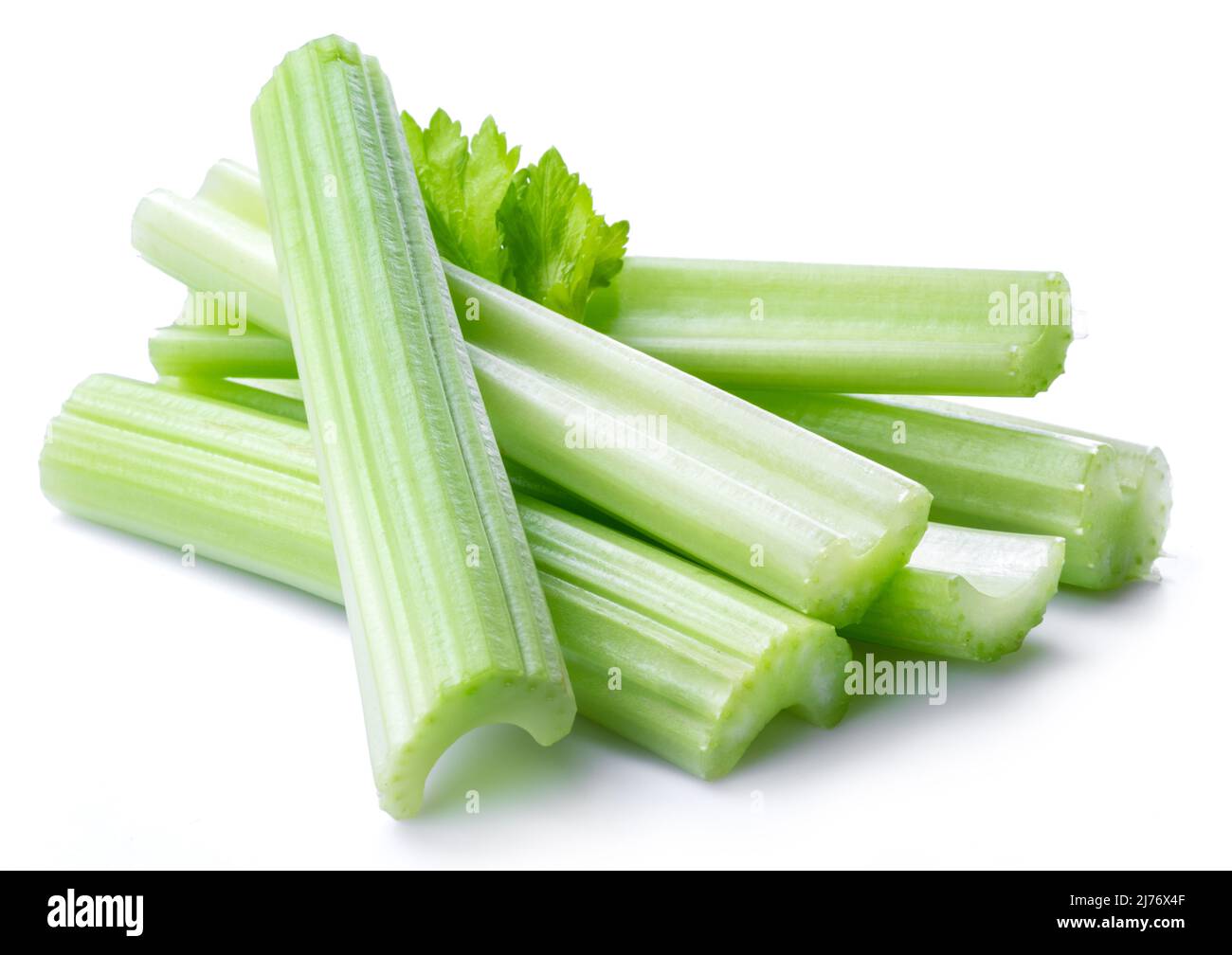 Pile of celery ribs isolated on white background Stock Photo - Alamy