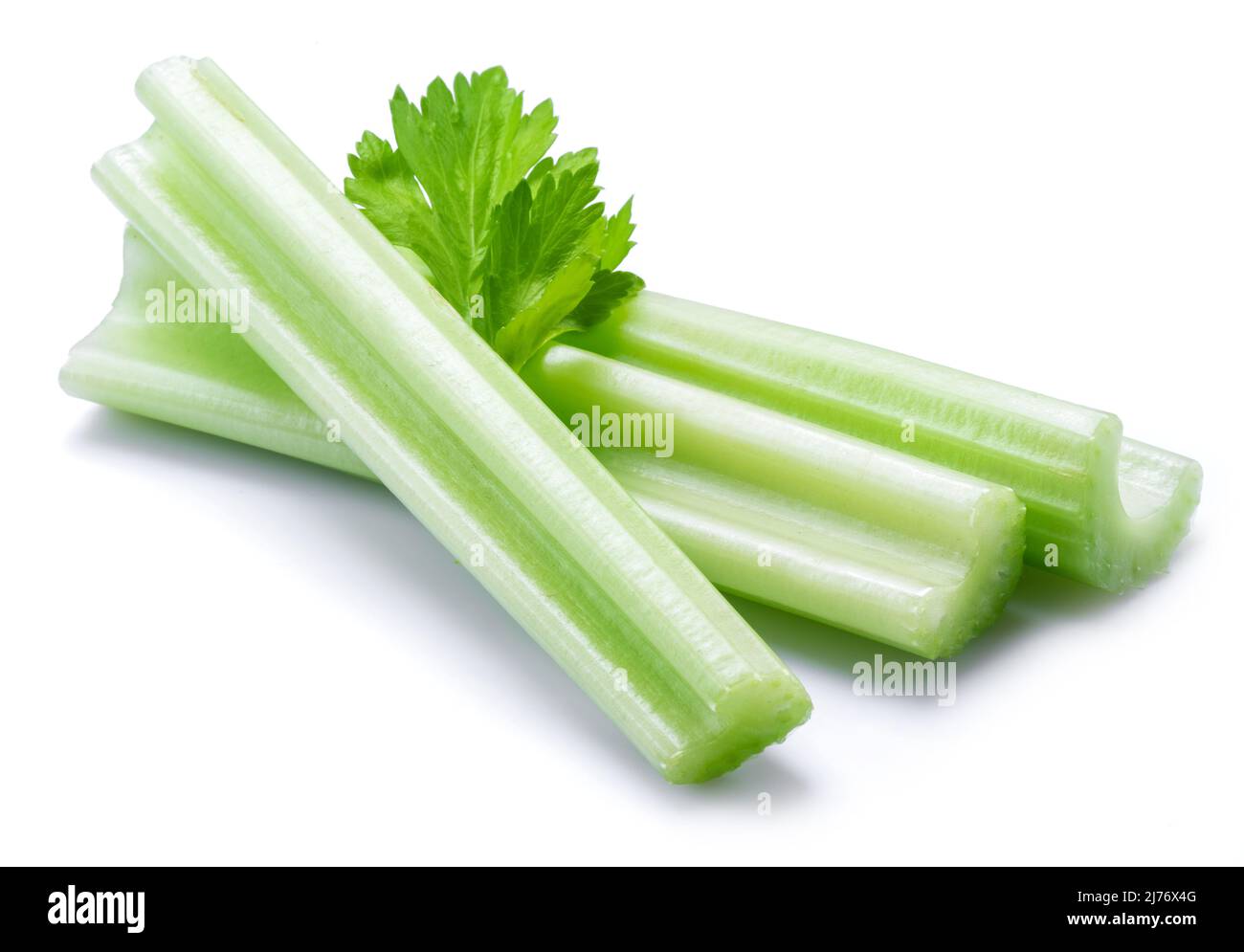 Pile of celery ribs isolated on white background Stock Photo - Alamy