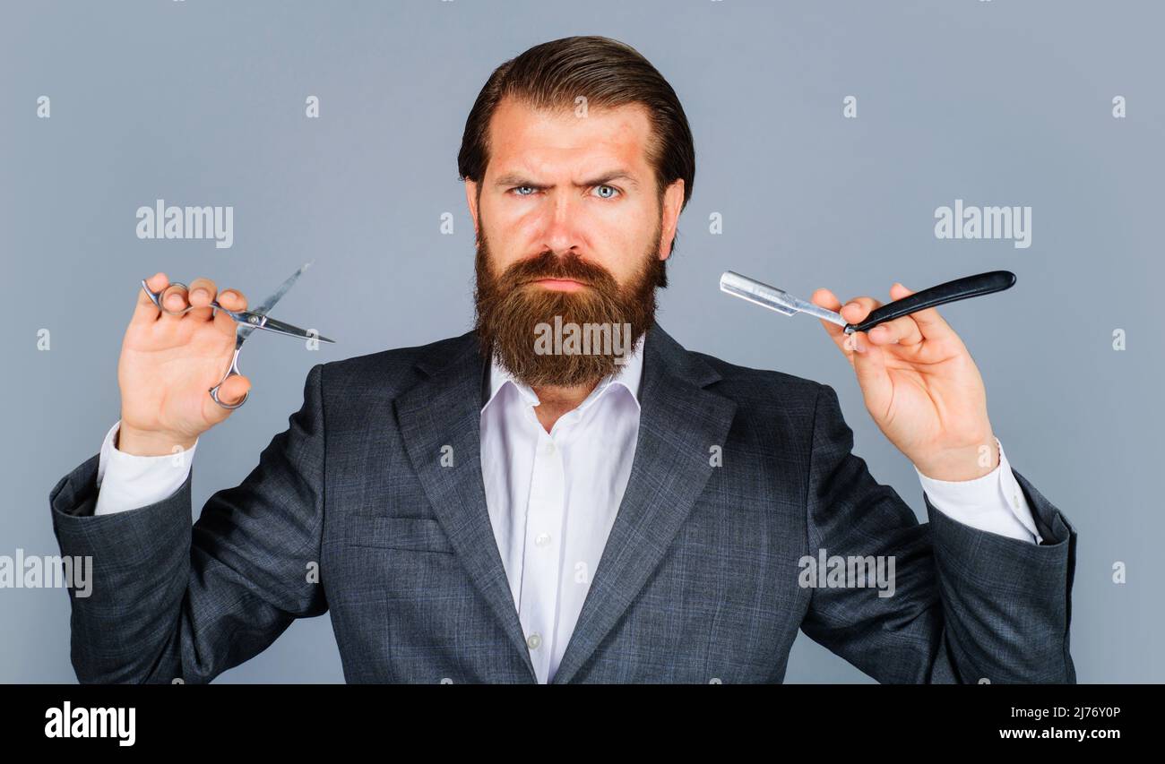 Barbershop Handsome Bearded Man With Scissors And Straight Razor