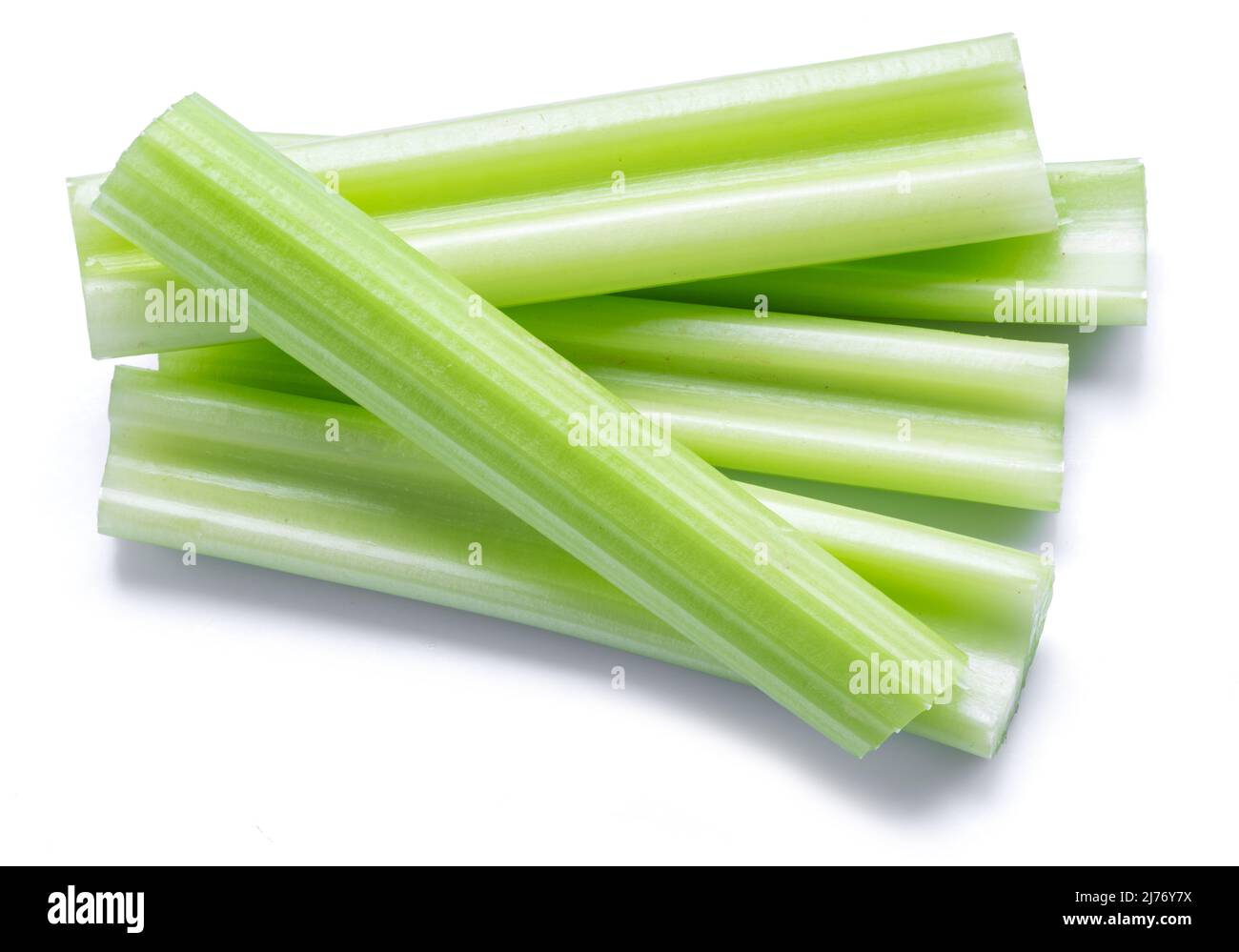 Pile of celery ribs isolated on white background Stock Photo - Alamy