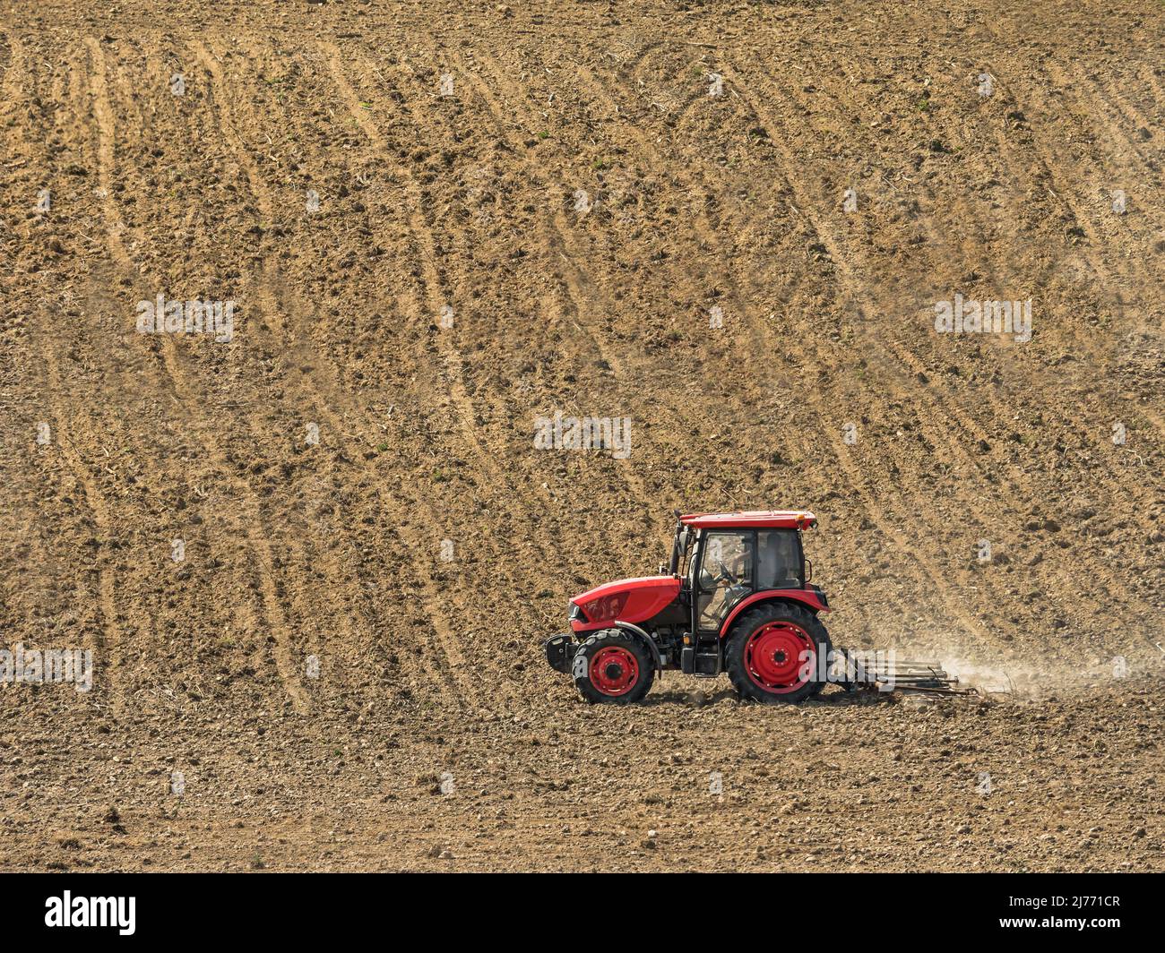 Harrowing land hi-res stock photography and images - Alamy
