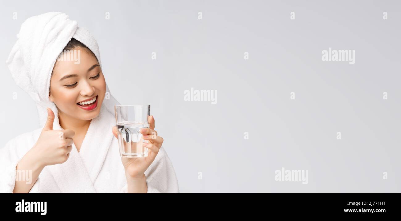 Healthy young beautiful woman drinking water, beauty face natural ...